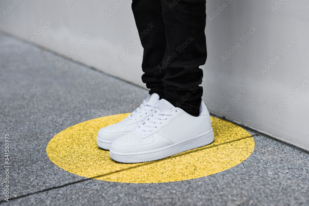 Standing alone for a social distancing Stock Photo | Adobe Stock