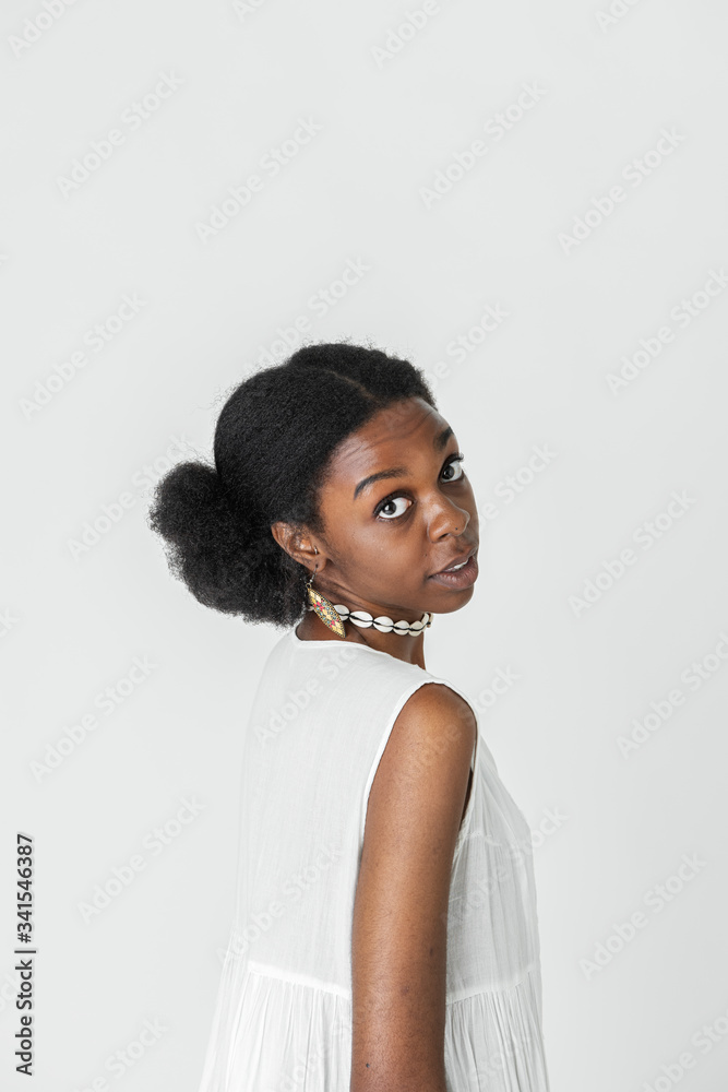 Cute black girl looking back Stock Photo | Adobe Stock