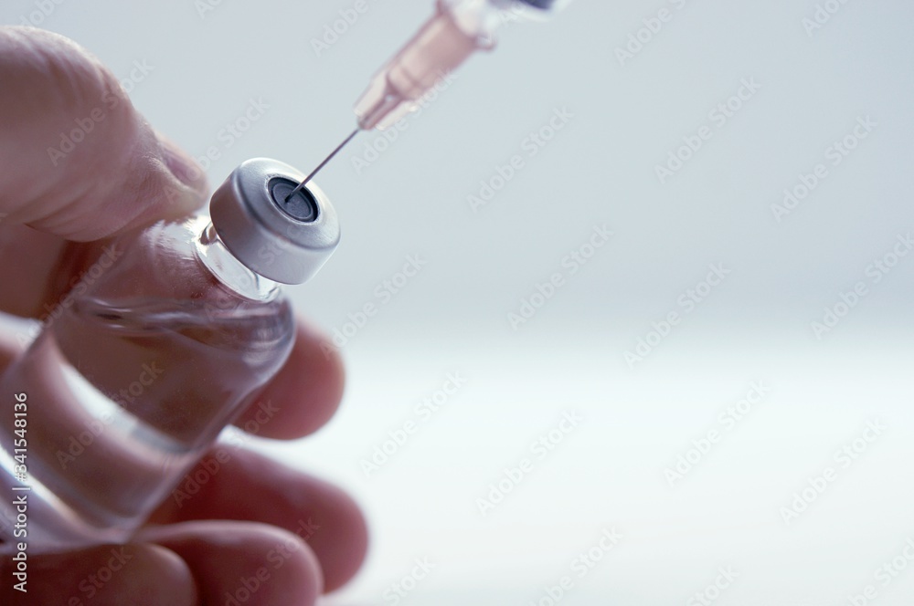 Vaccine vial dose flu shot drug needle syringe,medical concept ...