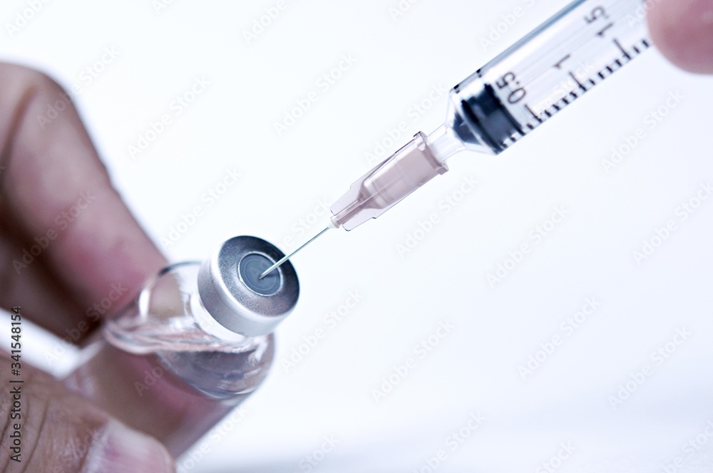 Vaccine vial dose flu shot drug needle syringe,medical concept ...