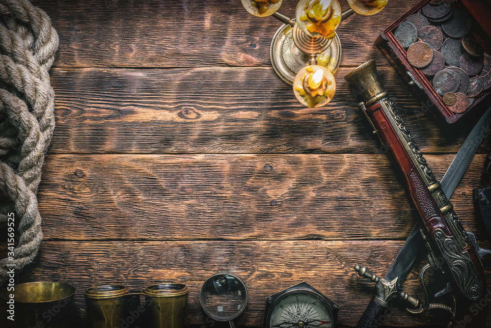 Pirate treasure chest with ancient coins and other various pirate ...