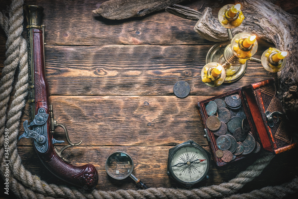 Pirate treasure chest with ancient coins and other various pirate ...