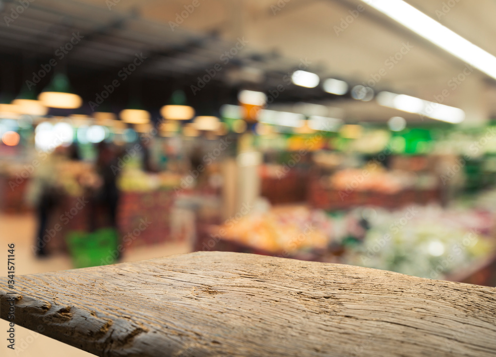 Supermarket background, Counter over blur grocery background, Wooden ...