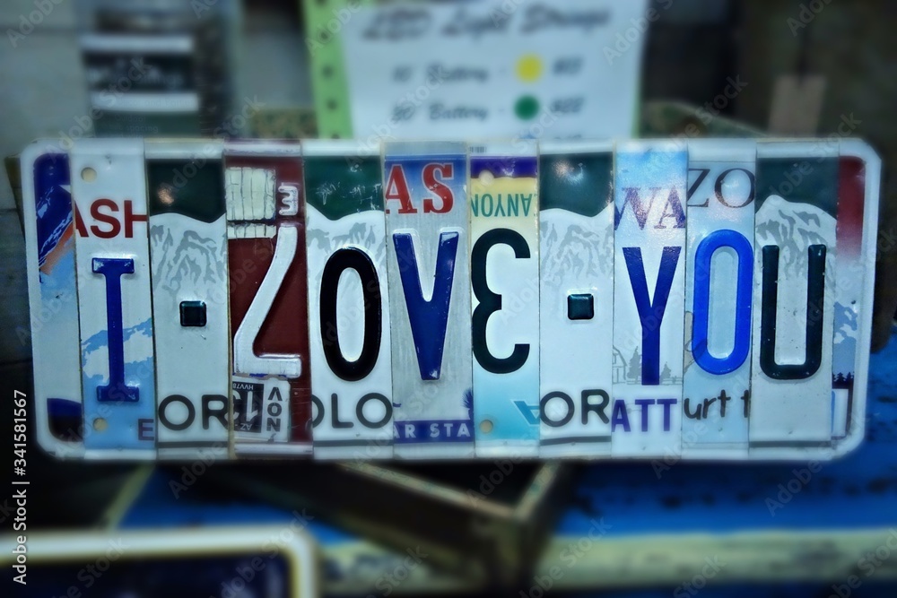 Unique vintage retro style I love you car license plate made up of a ...