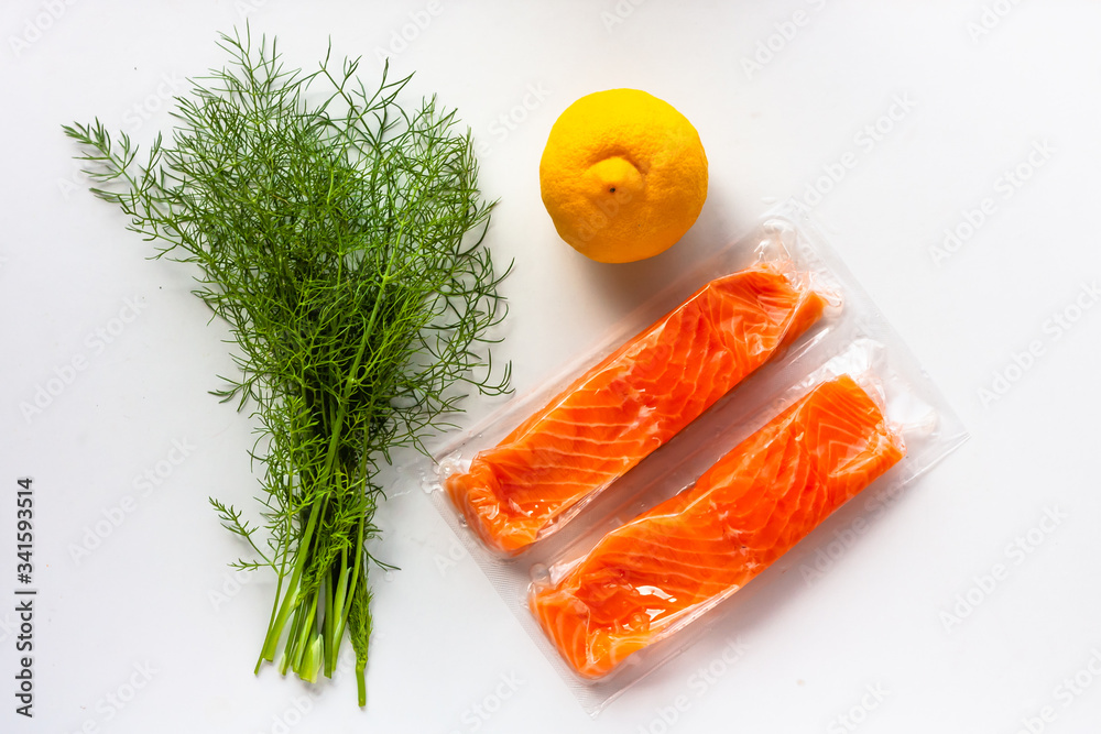 Red fish o salmon fillets in vacuum package on white background. Fresh ...