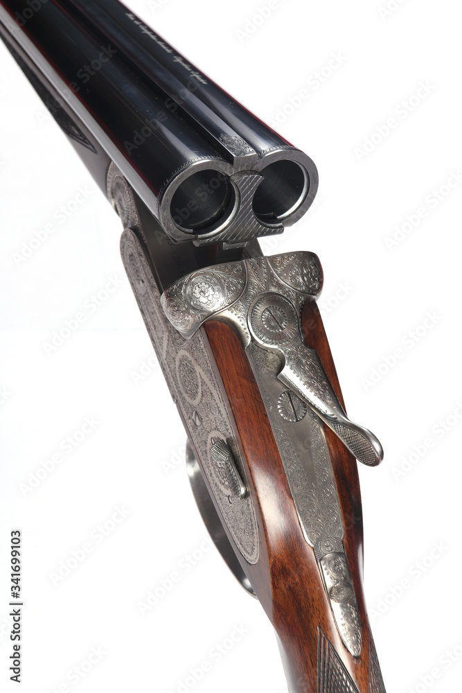 Side-by-side double-barreled spanish hunting shotgun isolated on white ...