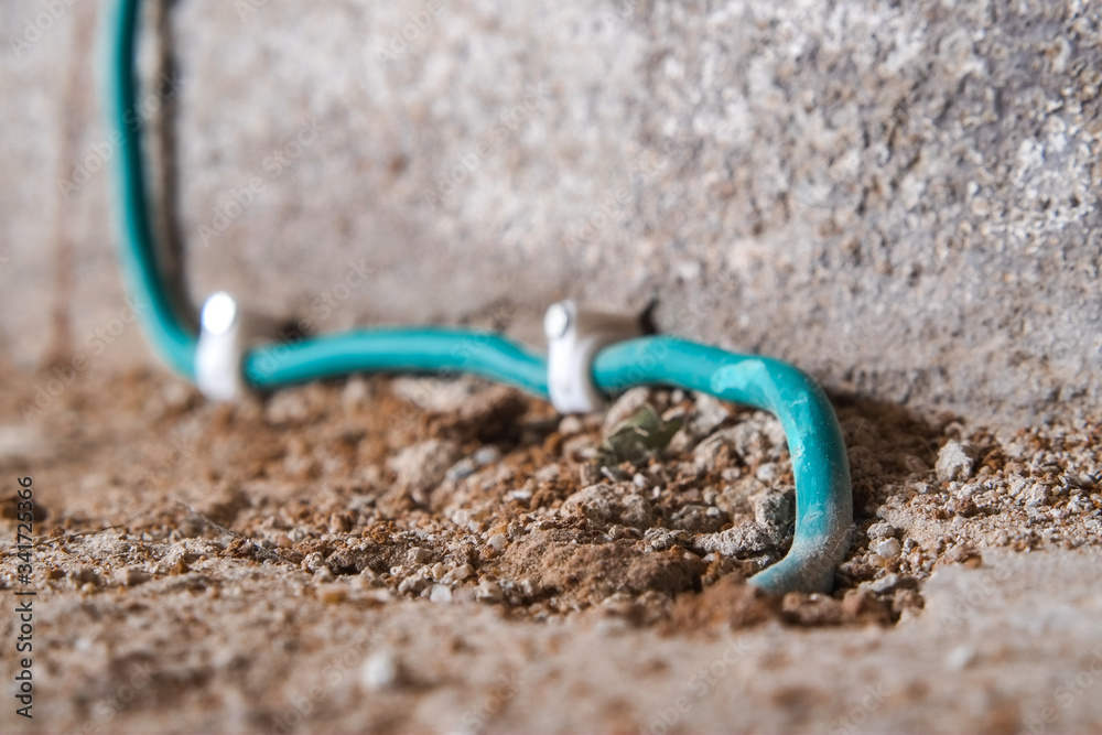 Green ground wire of copper rod connect to the ground for safety from ...