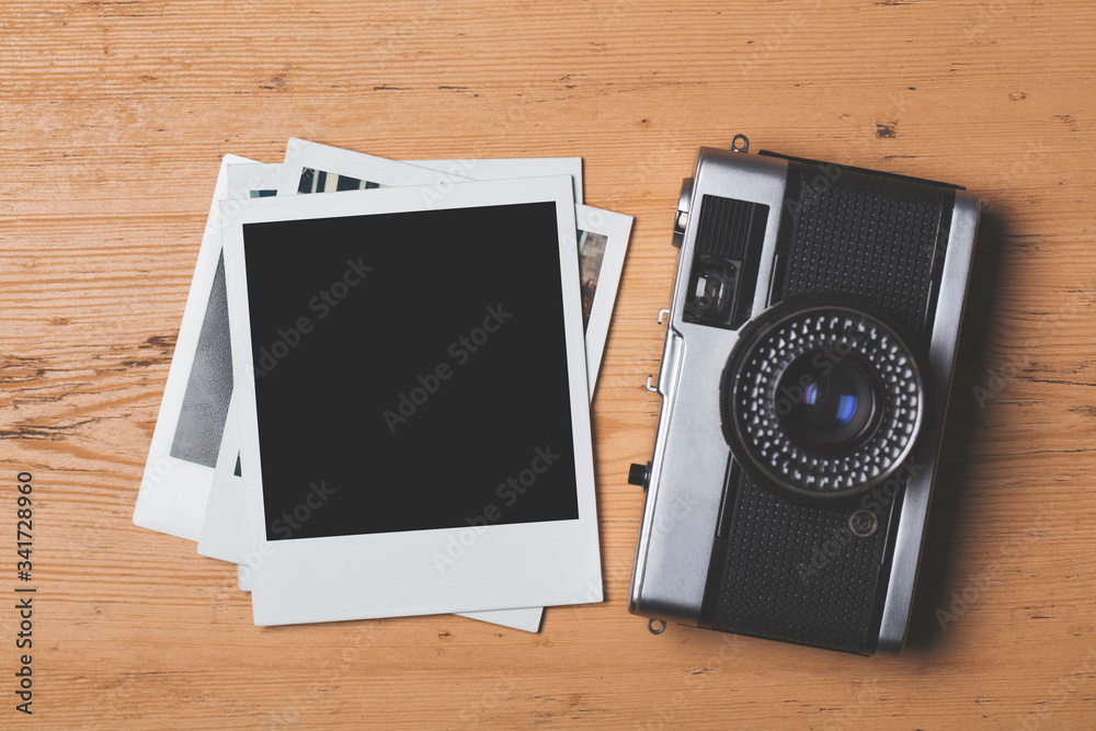 vintage retro camera with a blank instant photograph frame Stock Photo ...