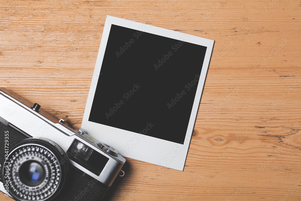 vintage retro camera with a blank instant photograph frame Stock Photo ...