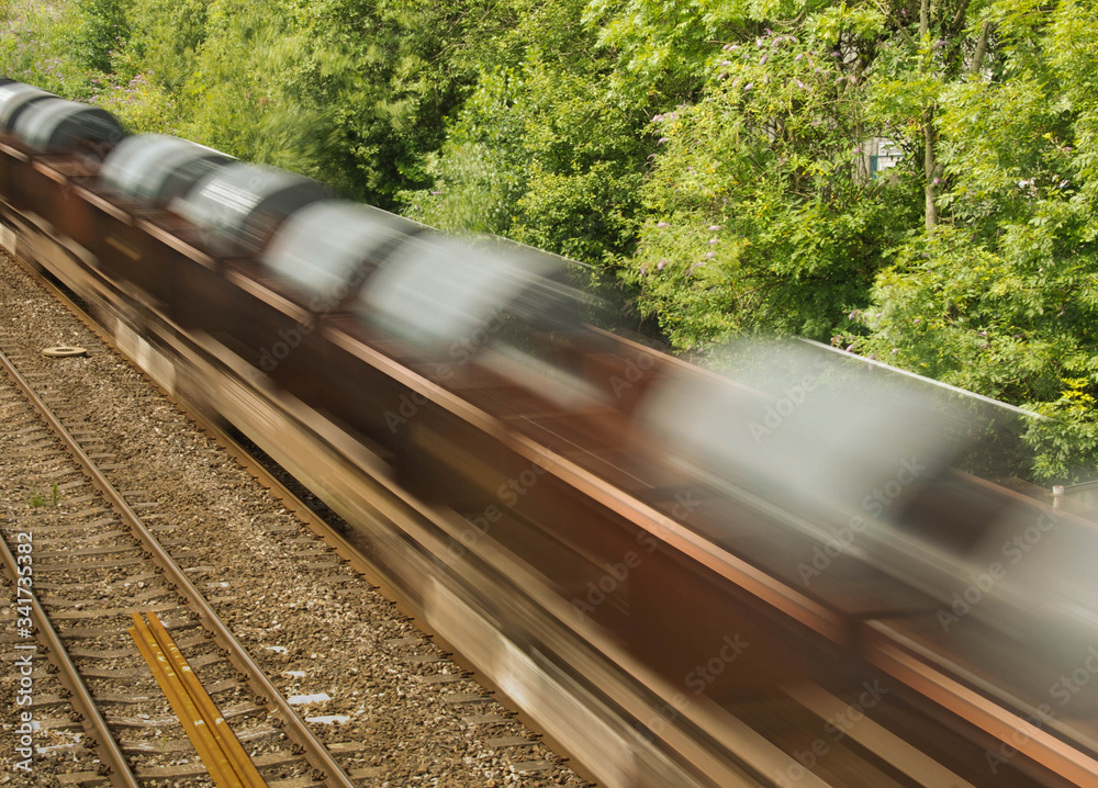 Cardiff, Wales - August 2017: The wagons of a freight train carrying ...