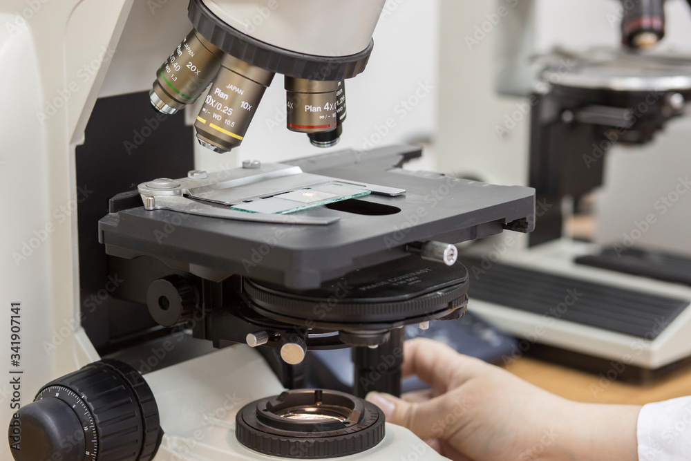 microscope in fabric laboratory Stock Photo | Adobe Stock