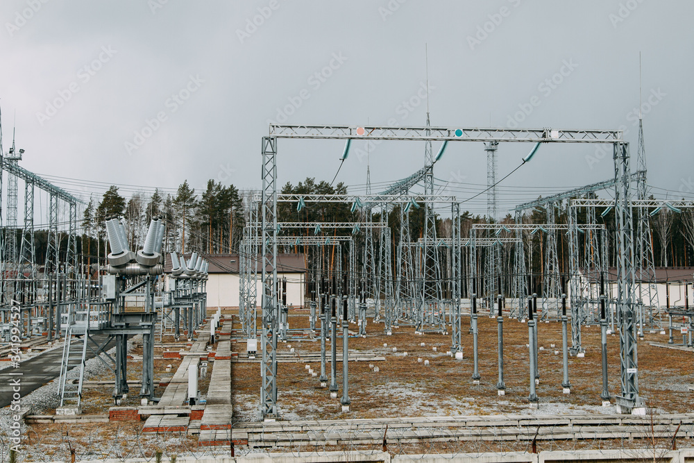 Poles and generator of the power station. A power station that supplies ...