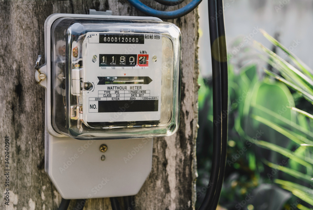 Electric power meter measuring power usage. Watt hour electric meter ...