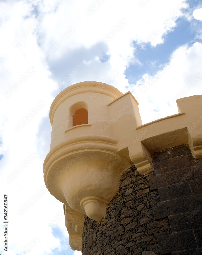 A turret and a crenelation, old European architecture detail, Spanish ...