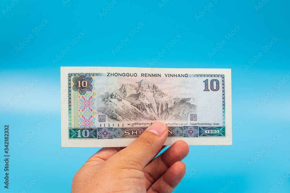 Man hold China 1980 old Banknotes. An Old paper banknote, vintage retro ...