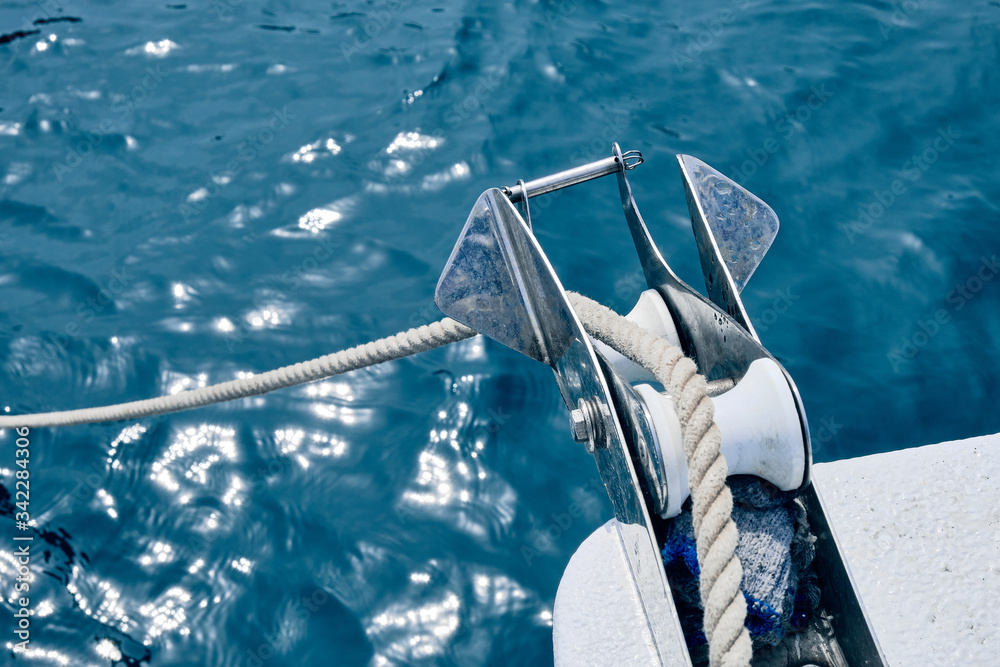 Bow of the sail boat with anchor rope. Sailing at summer sunny day ...
