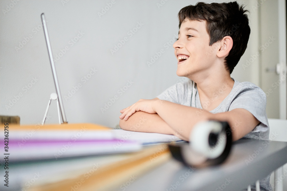 Cute caucasian boy doing homework at home. Happy boy doing tasks. Stock ...