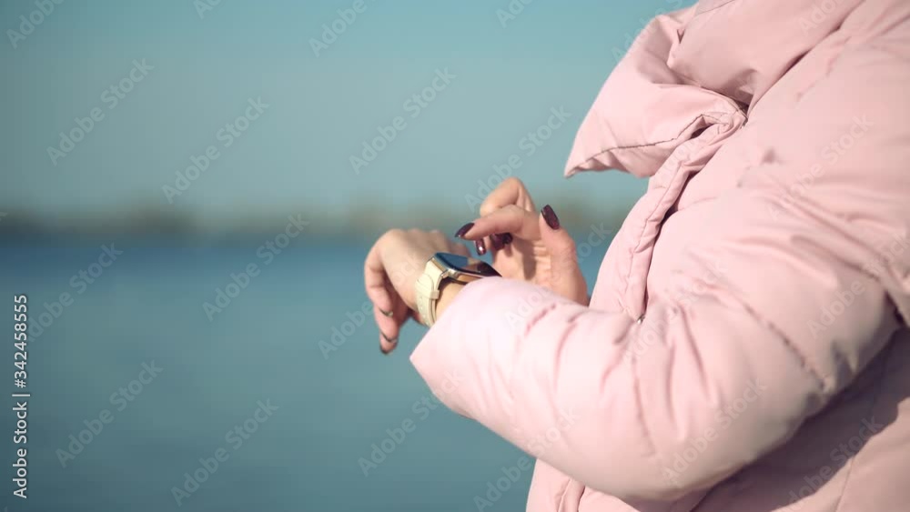 Girl Using Smart Watch Wearable Wristband Device.Female Checking Pulse ...
