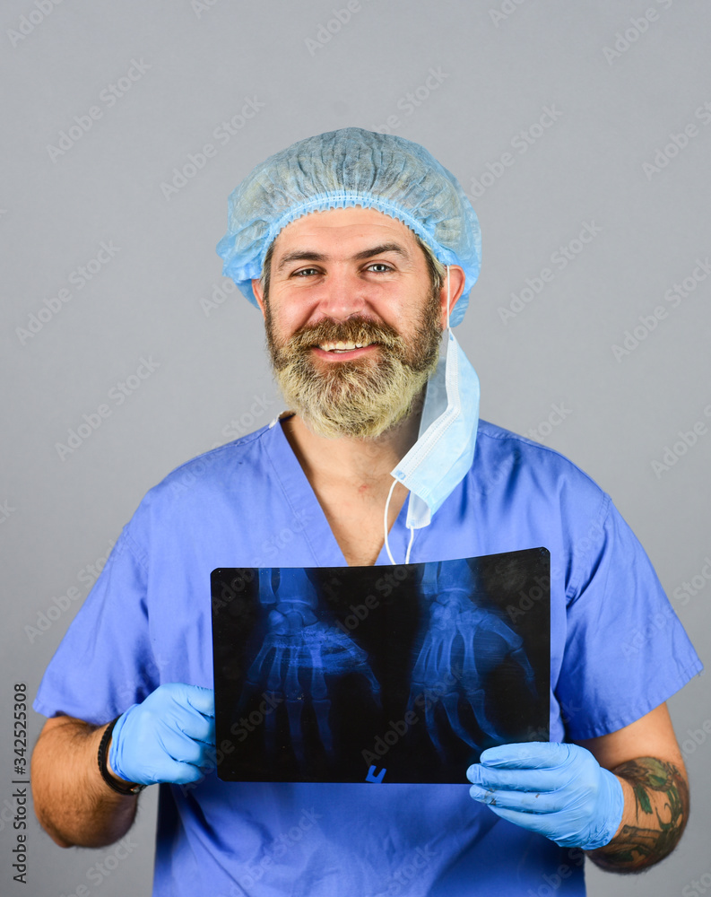 Doctor holds pictures of bones. Fracture and bone damage. Doctor ...