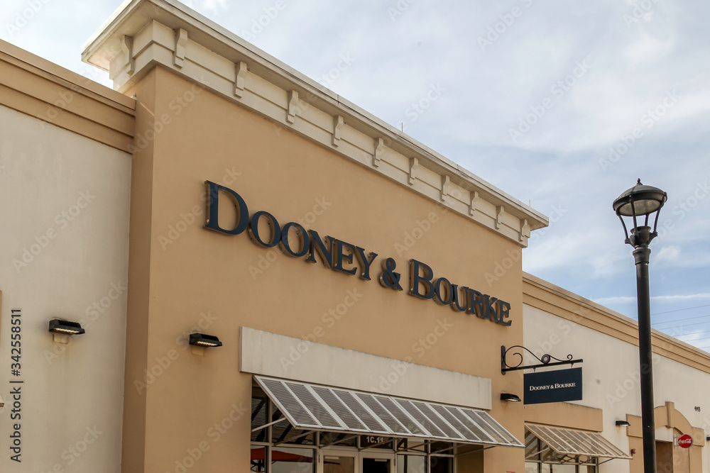 Orlando, Florida, USA - February 5, 2020: Dooney & Bourke store sign on ...