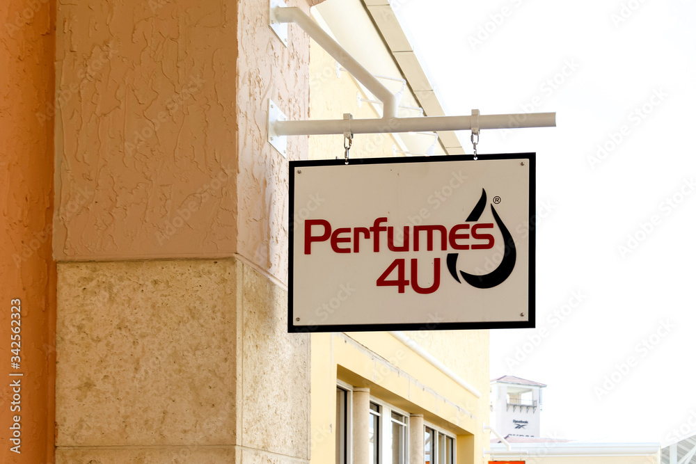 Orlando, Florida, USA - February 24, 2020: Perfumes 4U hanging sign ...