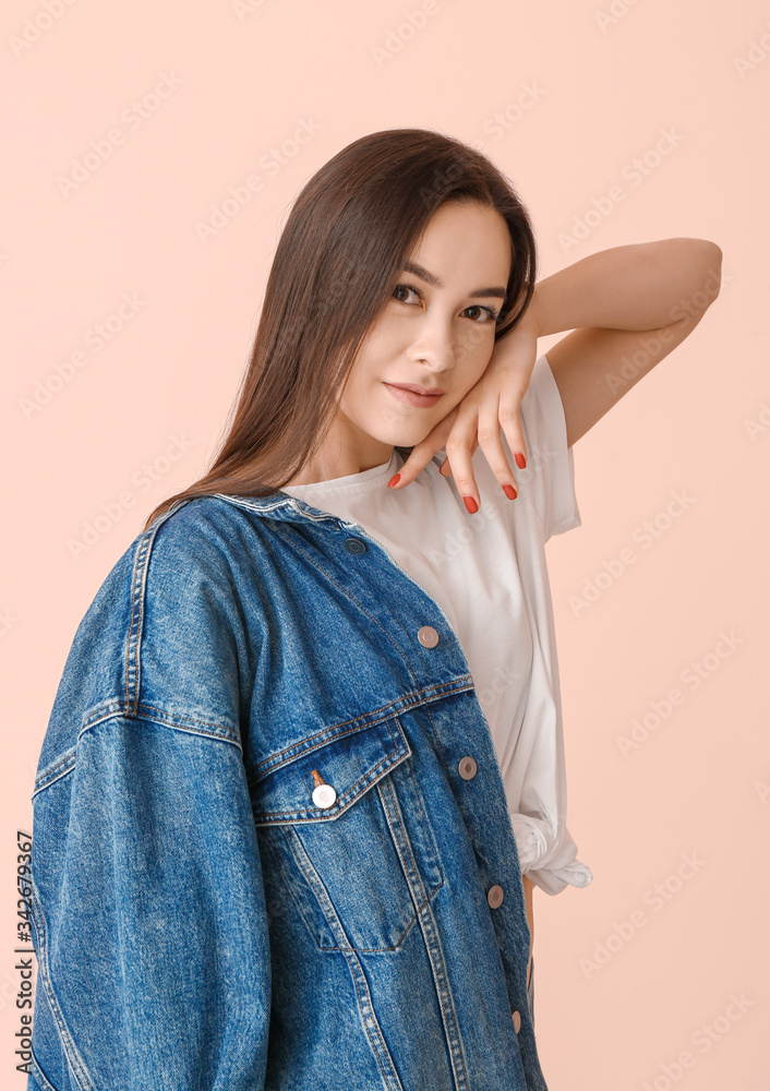 Portrait of beautiful young woman on color background Stock Photo ...