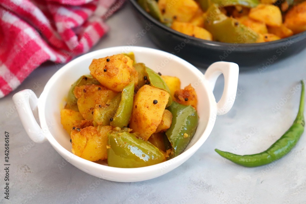 Indian food - Spicy Capsicum and potato stir fried with Indian spices ...