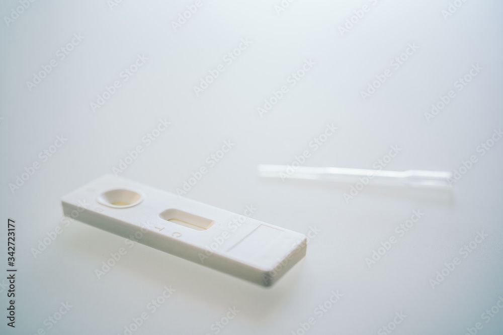 Rapid tests for detection of Covid-19 on white background. Rapidly ...