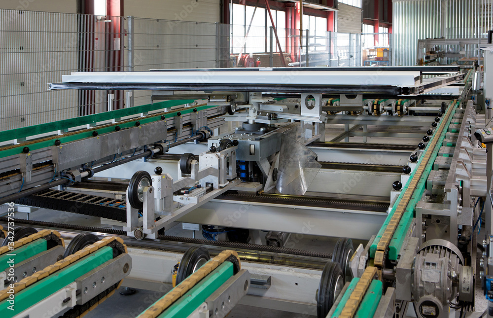 Production of aluminium window frames. Window sills. Automation. Stock ...