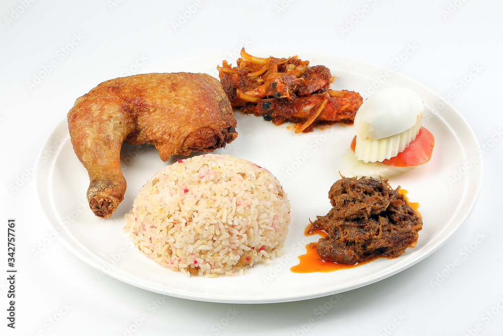 Indonesian royal dish nasi bojari with deep spiced deep fried chicken ...