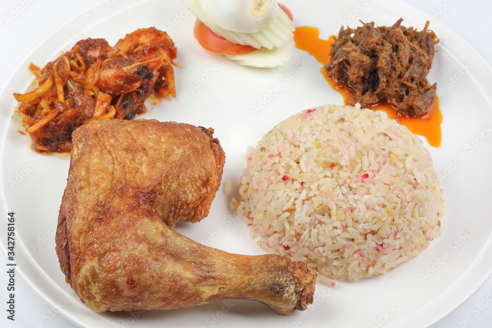 Indonesian royal dish nasi bojari with deep spiced deep fried chicken ...