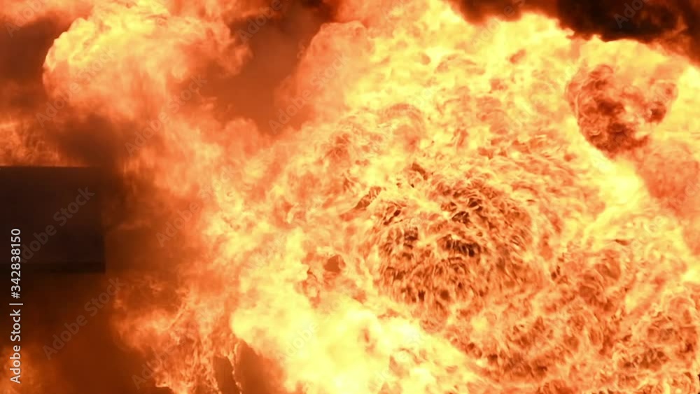 Big real fire of gas and oil explosion bursting through air.The ...