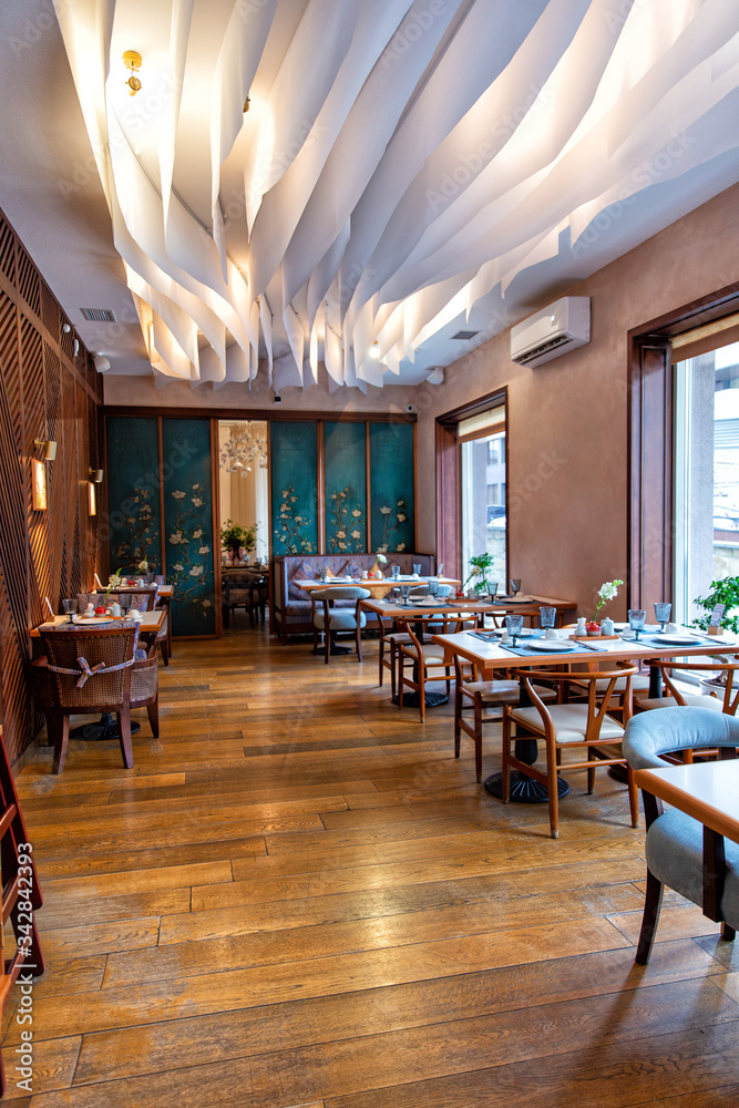 Interior of cozy Chinese restaurant Stock Photo | Adobe Stock