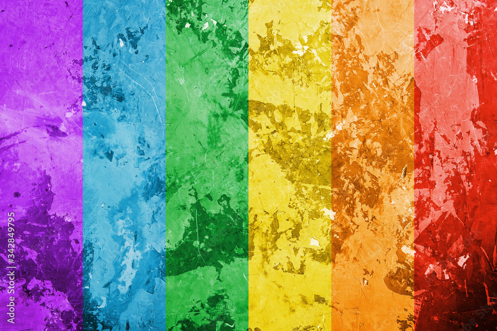 gay rainbow flag with vertical stripes on concrete background as lgbt ...