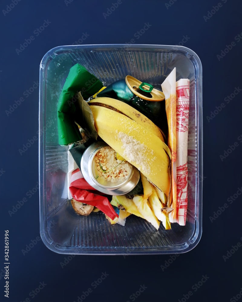 Plastic box with day food waste, packaging and leftovers, collage ...