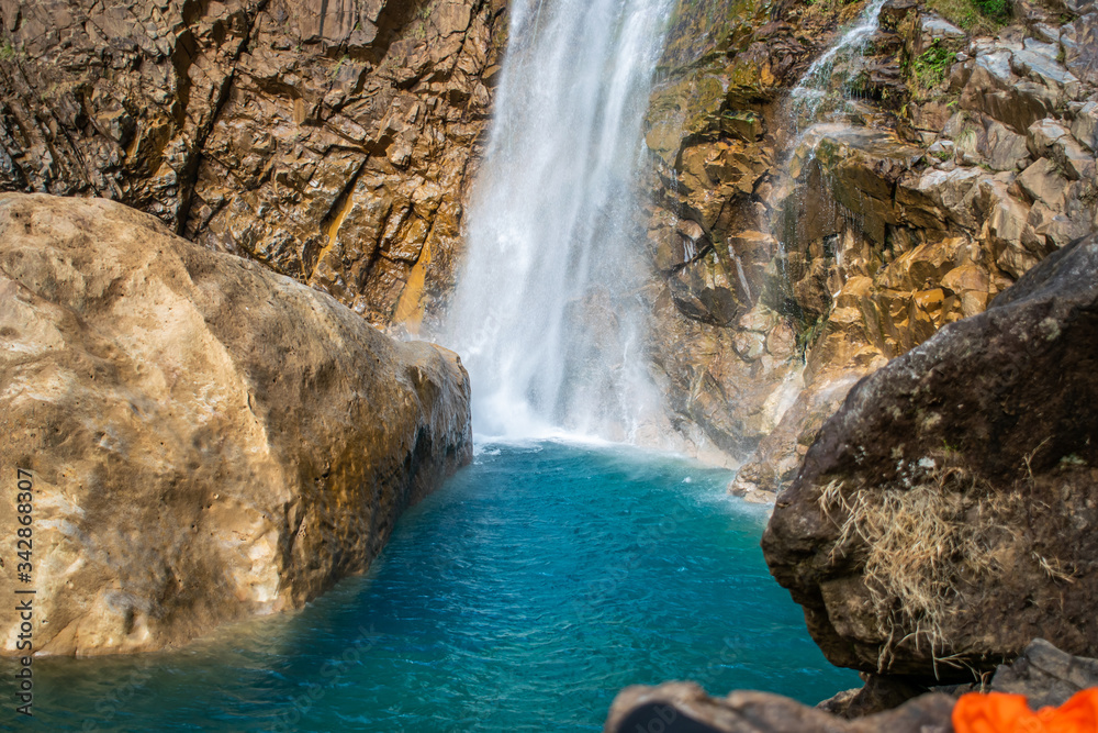 Amazing Rainbow waterfall with crystal clear blue coloured natural ...