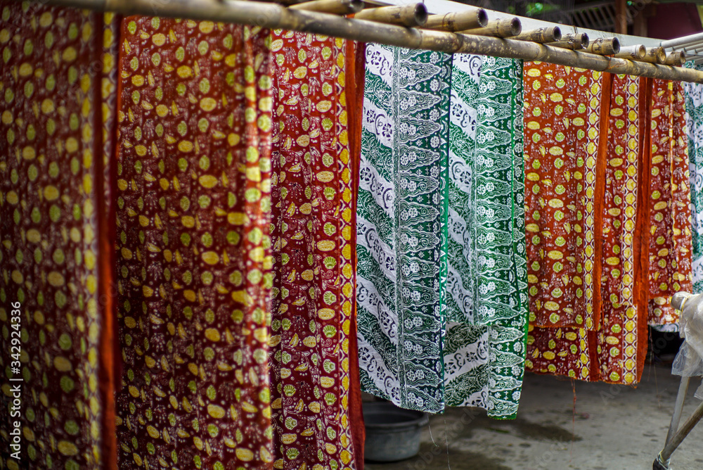 Solo Indonesia, Jne 03 2020 : Batiks hanging along blue sky background ...