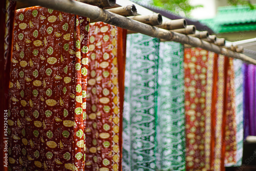 Solo Indonesia, Jne 03 2020 : Batiks hanging along blue sky background ...