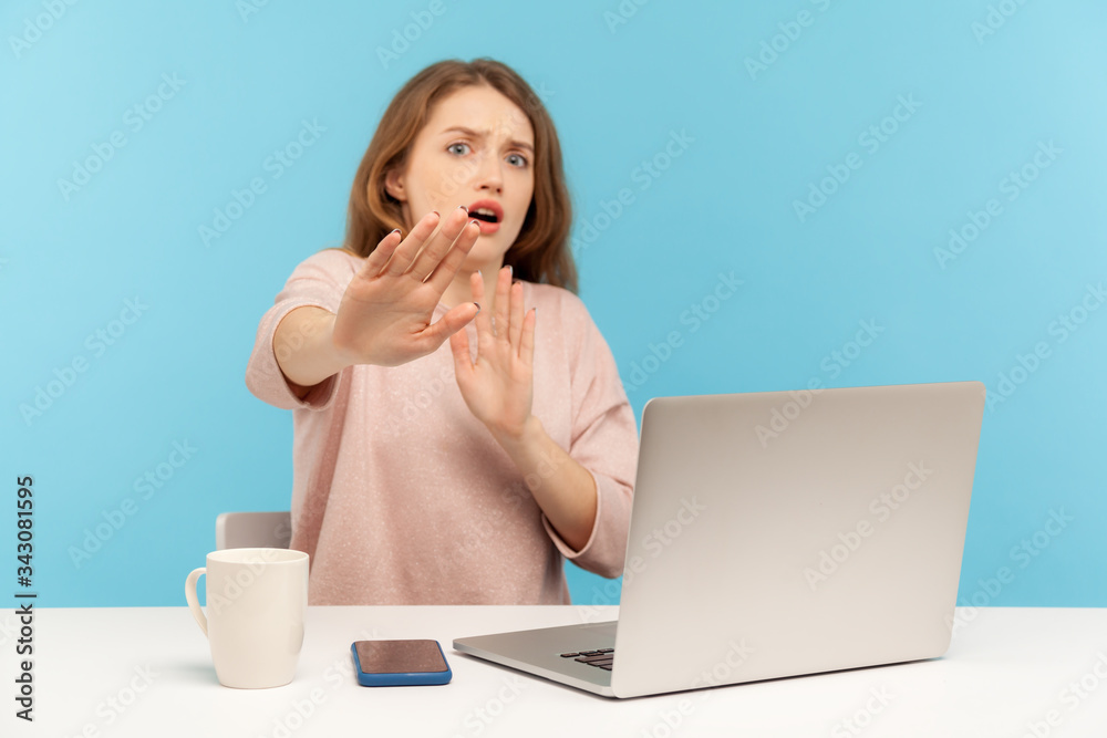 No, I'm scared! Frightened woman with shocked expression raising hands ...