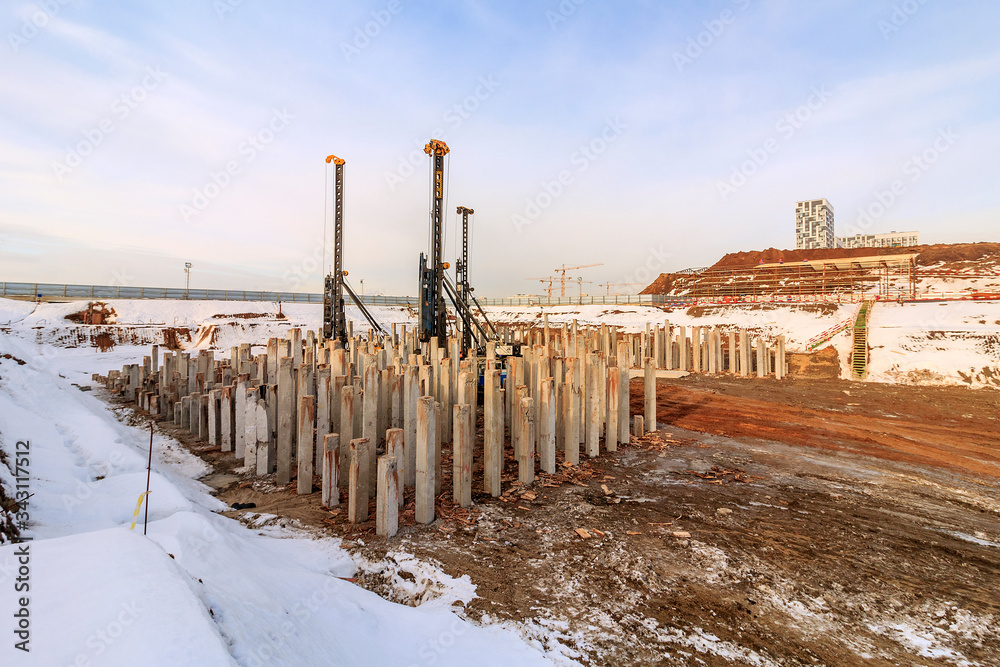Pile driving in foundation pit construction apartment building. Piling ...