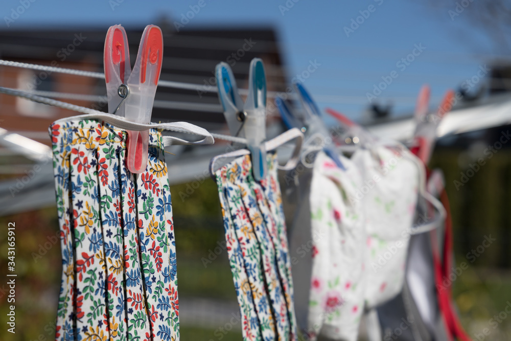 handmade face mask on clothes line to wear in corona crises Stock Photo ...
