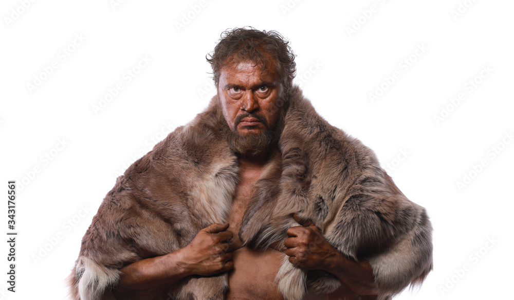 Neanderthal man, primitive caveman in the skin, troglodyte Stock Photo ...