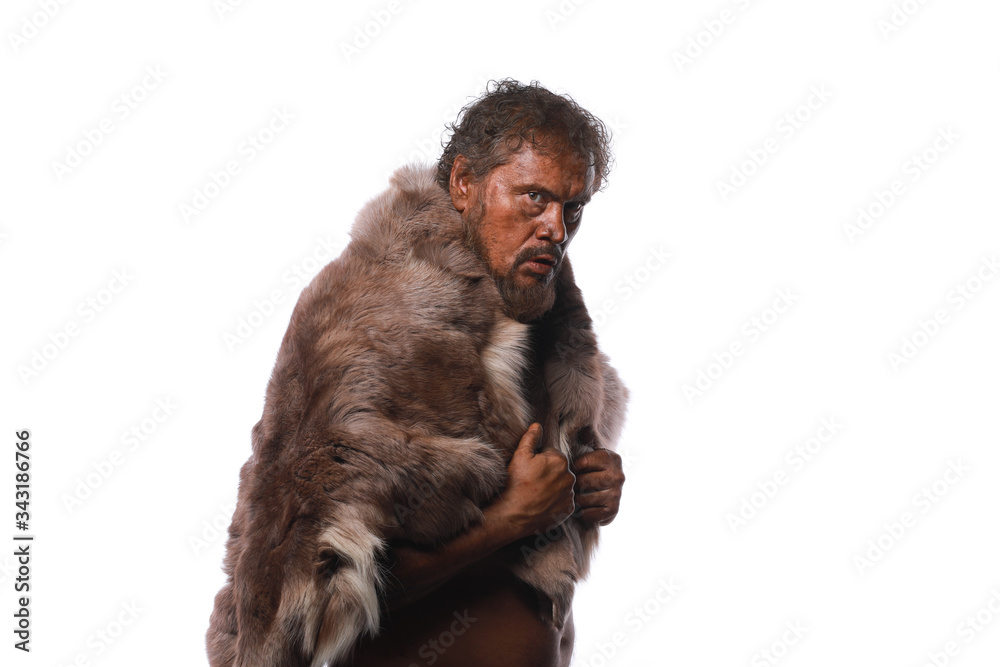 Neanderthal man, primitive caveman in the skin, troglodyte Stock Photo ...