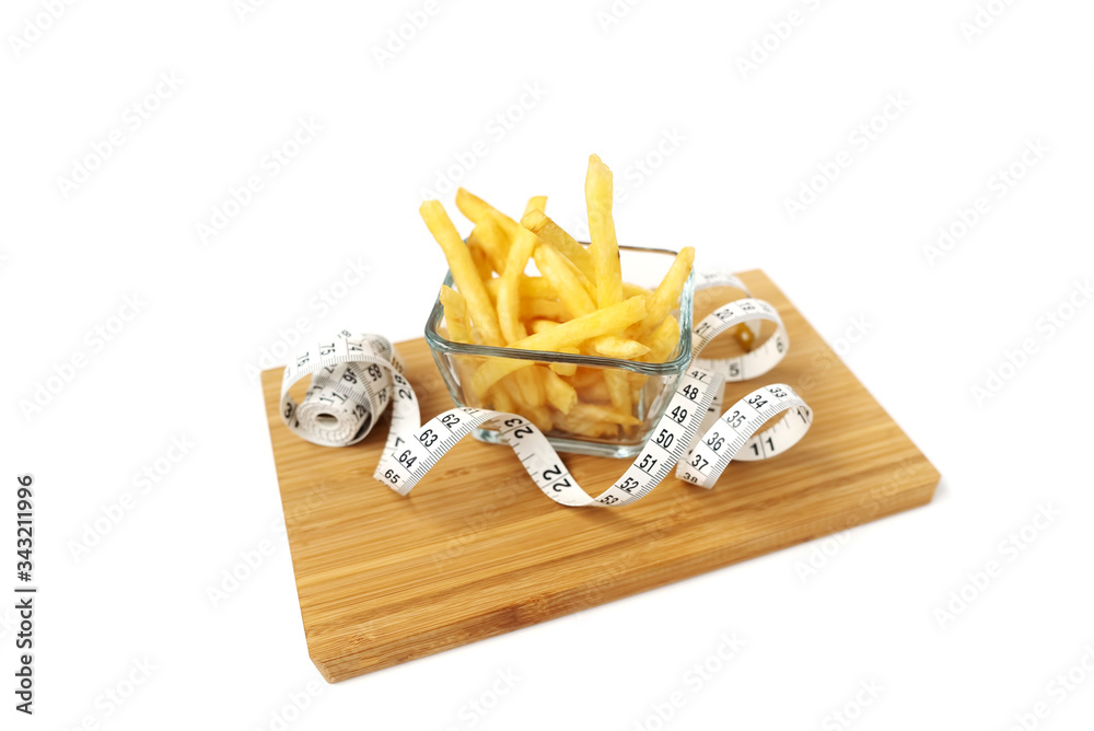 French fries in a glass plate. Bamboo board. White background. Isolated ...