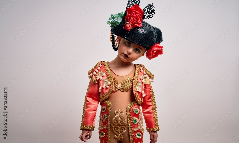 Young little caucasian kid girl wearing bullfighter traditional folkore ...