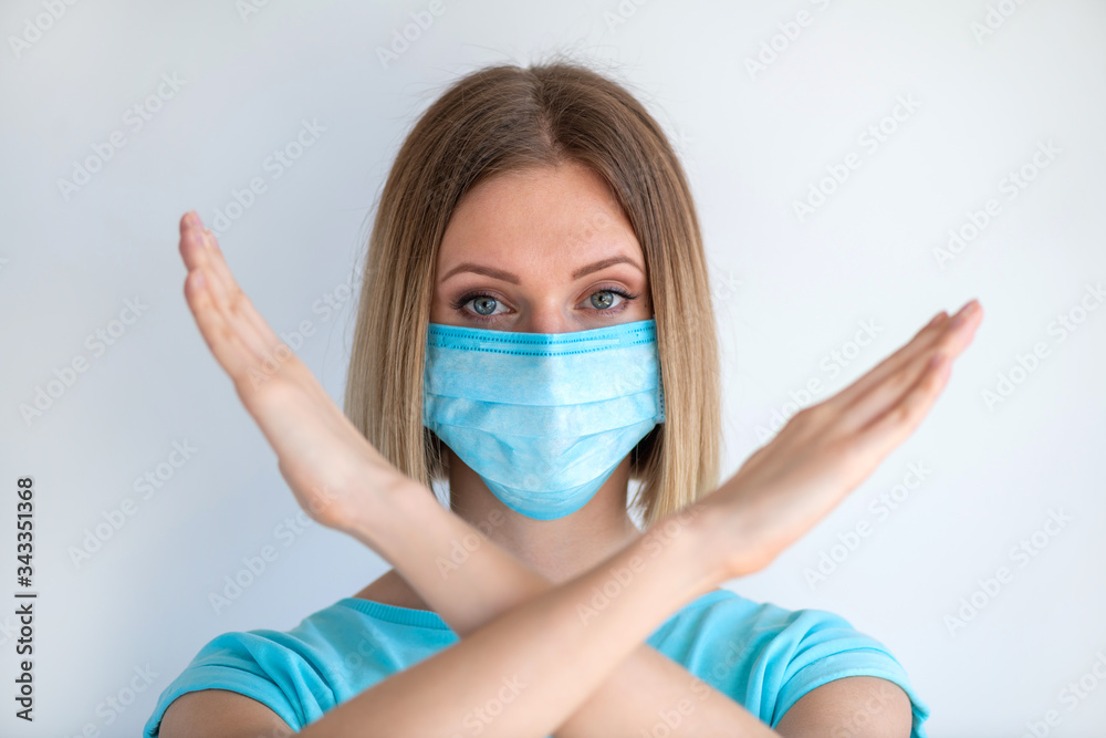 Attractive female nurse showing stop sign with his hand gesture ...
