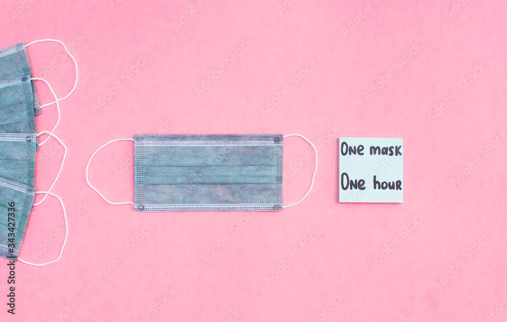 medical masks are laid out, but in a one-time background, an ...