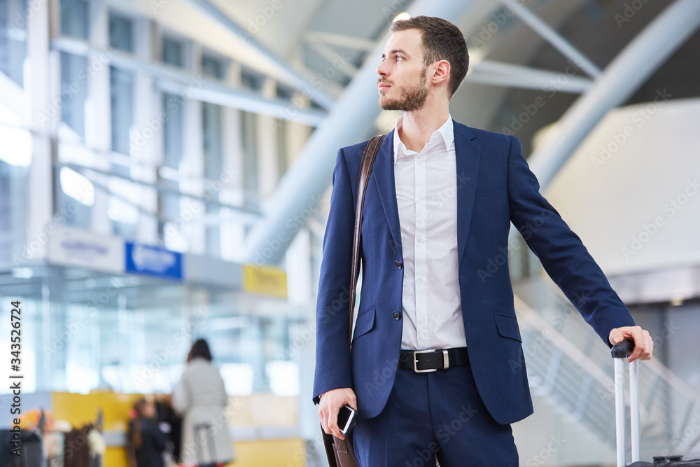 Business man in the airport at stopover Stock Photo | Adobe Stock