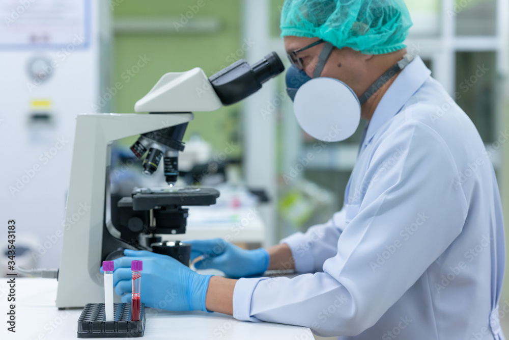 Scientists are studying research on the germs that cause COVID-19, the ...