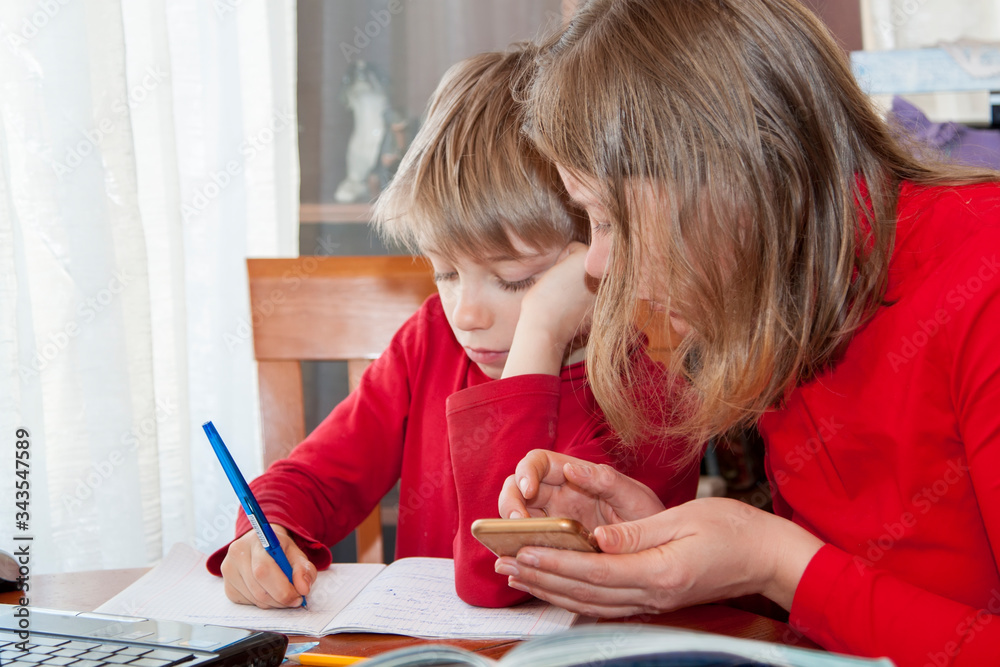 remote online education at home. Child studying from home with help of ...